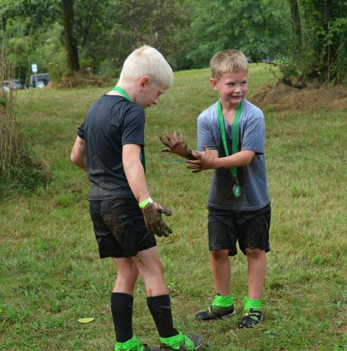 Dirty Dash in Beloit has kids running, climbing, crawling in the muck | Local News ...
