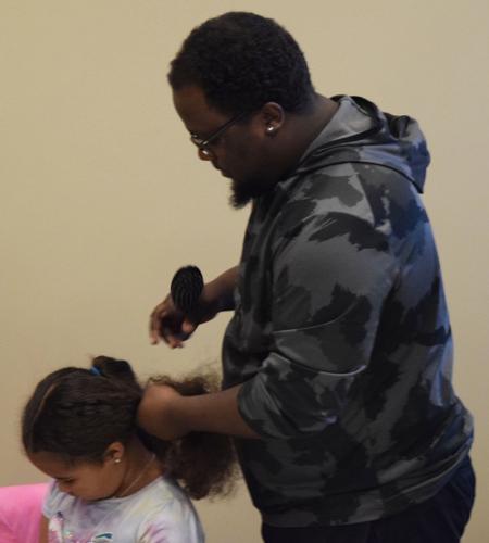 Beloit dads learn to bond with daughters through hair styling | Local ...