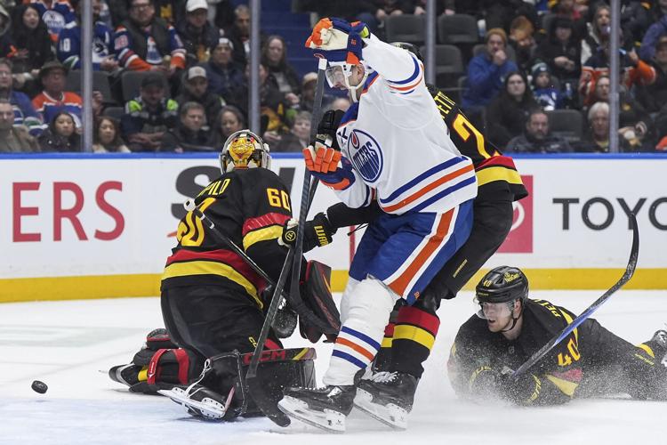 Jarry makes 31 saves in Oilers' 6-0 victory as Canucks drop 10th ...