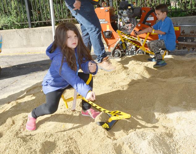 Kids dig into construction job fun at Community Construction Zone event ...