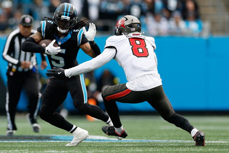 Bryce Young throws 2 TDs, Panthers finally beat Bucs 23-20 to take over ...