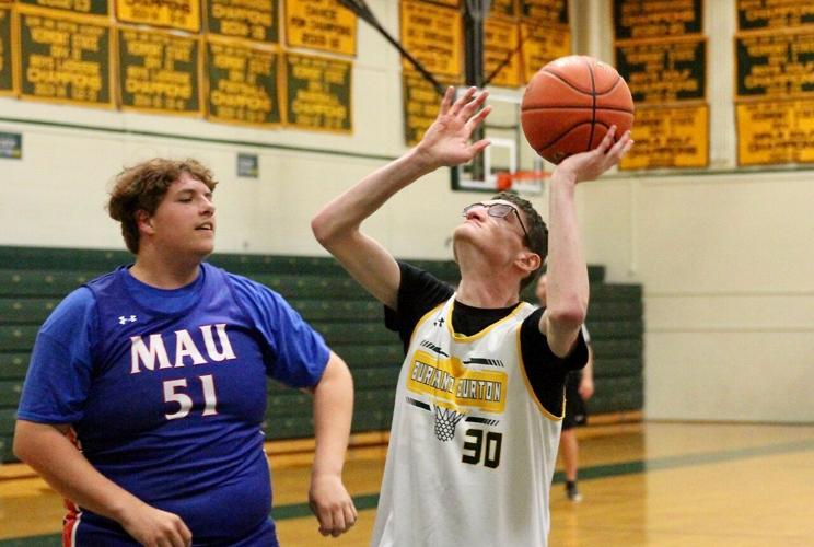 Rivals, unified: Burr and Burton, Mount Anthony share the court ...