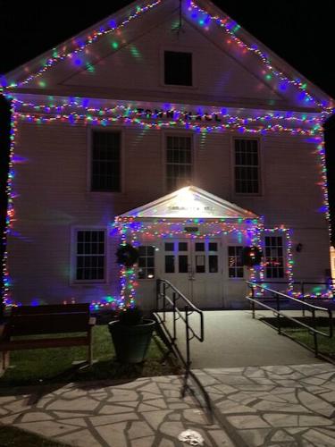Community spirit on display as Arlington lights its tree, celebrates ...