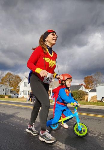 Superheroes take to the streets to benefit local Teens 4 Change | Local ...