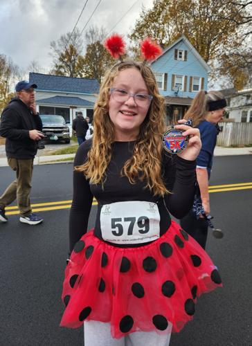 Superheroes take to the streets to benefit local Teens 4 Change | Local ...