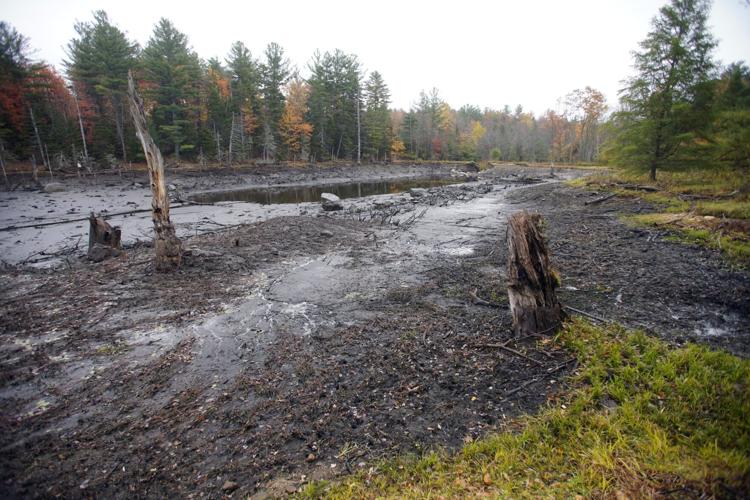 Photos: A look at the damage from the dam break in Hinsdale ...