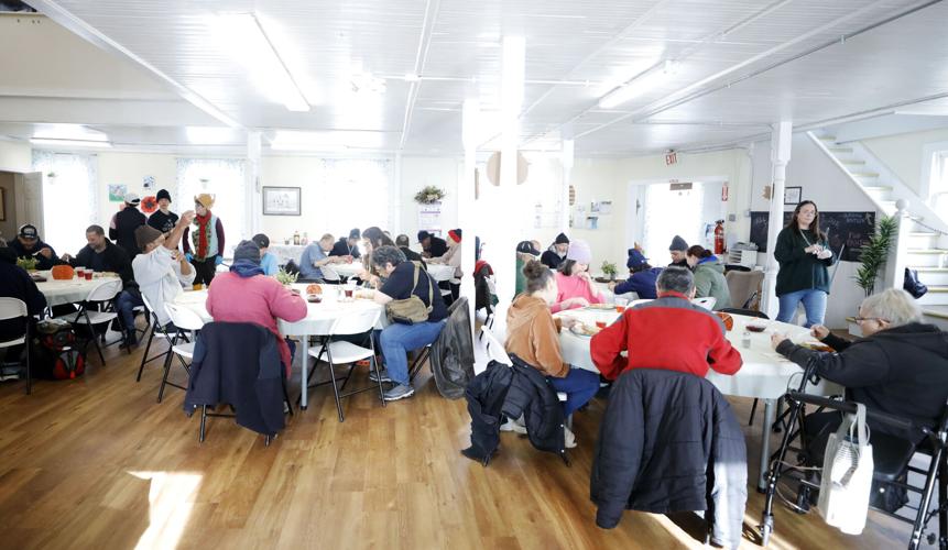 Photos: Thanksgiving meal delivery and community dinner at The ...