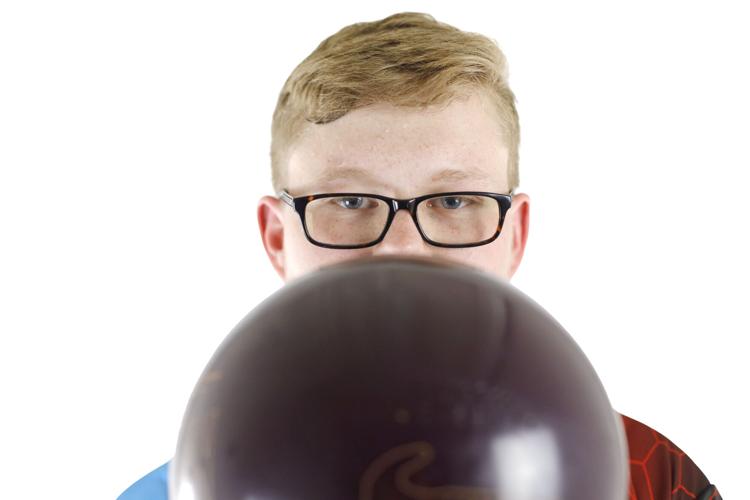 Photos: Bowler Andrew Robitaille returns from run to National ...