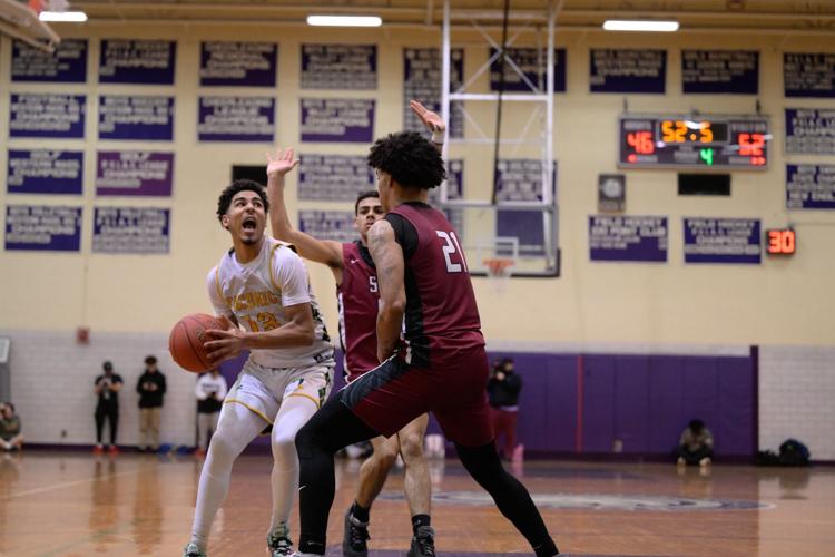 Photos: Taconic boys basketball battles Springfield International in ...