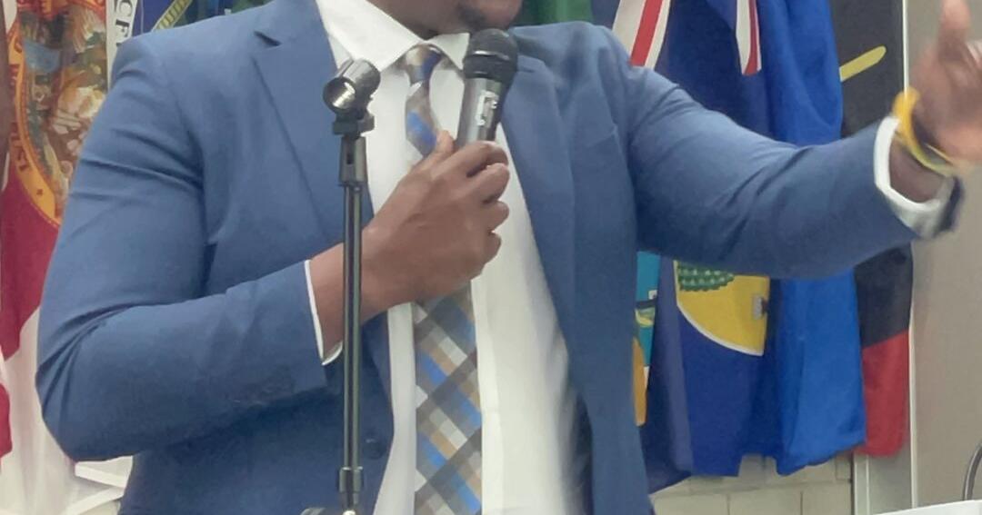 A man speaks at a microphone | | The Berkshire Eagle