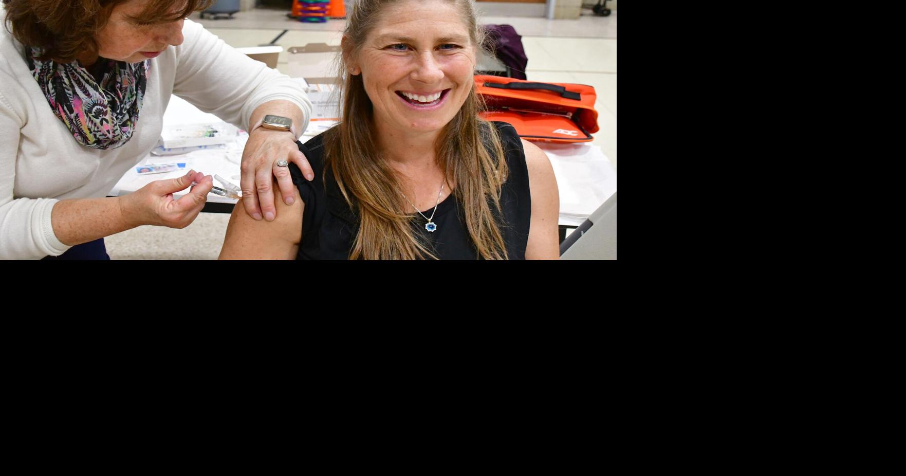 Photos: Covid Booster and Flu Vaccination Clinic | Multimedia ...