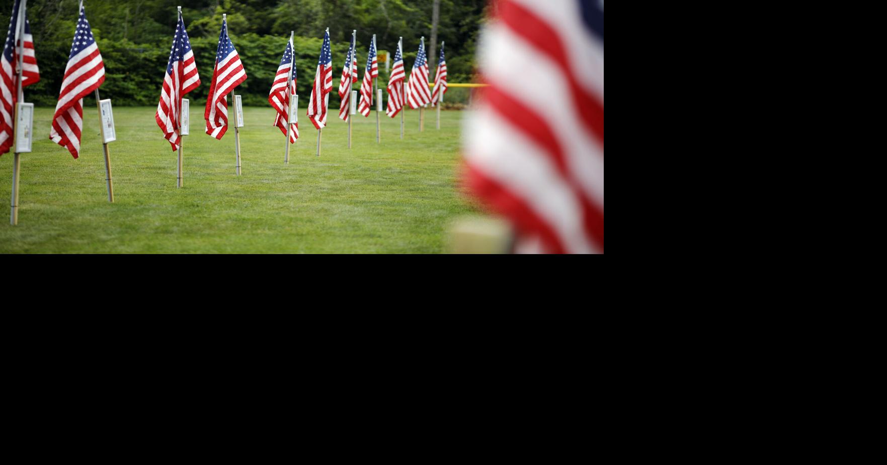 flags and biography cards on stakes | | berkshireeagle.com