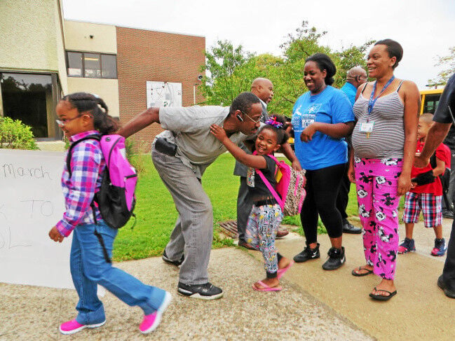 Volunteers welcome Morningside, Conte students to first day of school ...