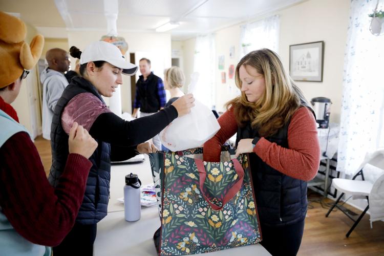 Photos: Thanksgiving meal delivery and community dinner at The ...