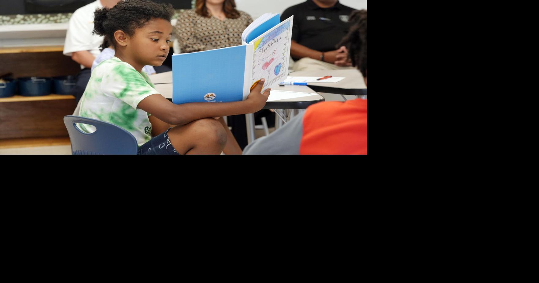 Crosby Elementary third graders show off their homemade books about ...