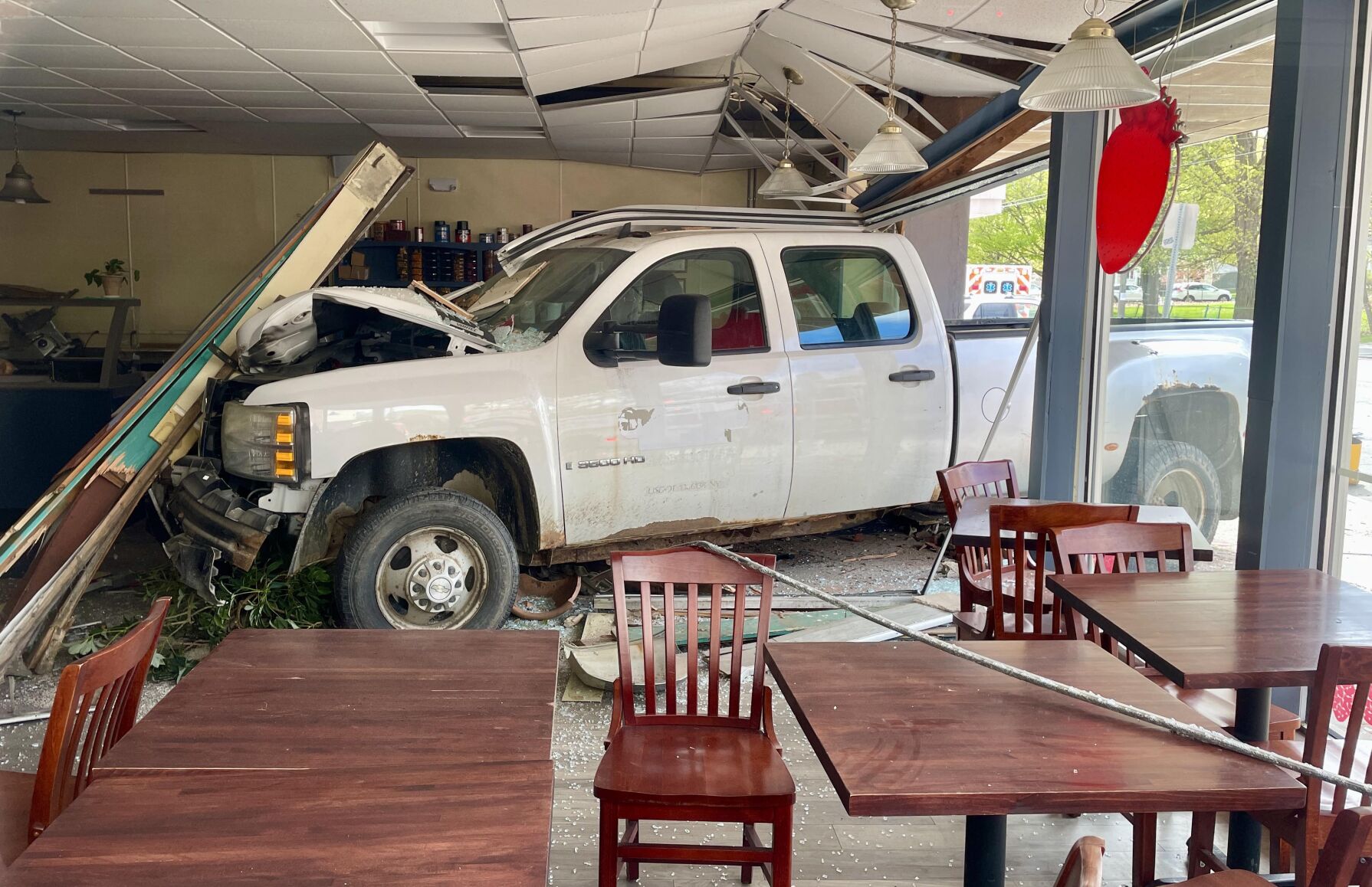 'It happened so quick.' Pickup truck crashes into Samel's Deli on Elm ...