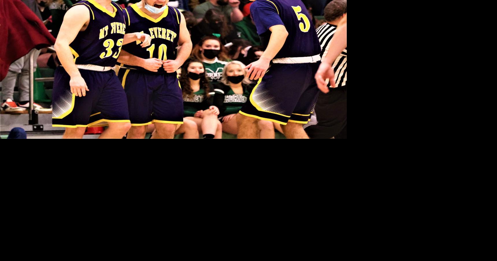 Photos: Mount Everett boys basketball battles at McCann Tech ...
