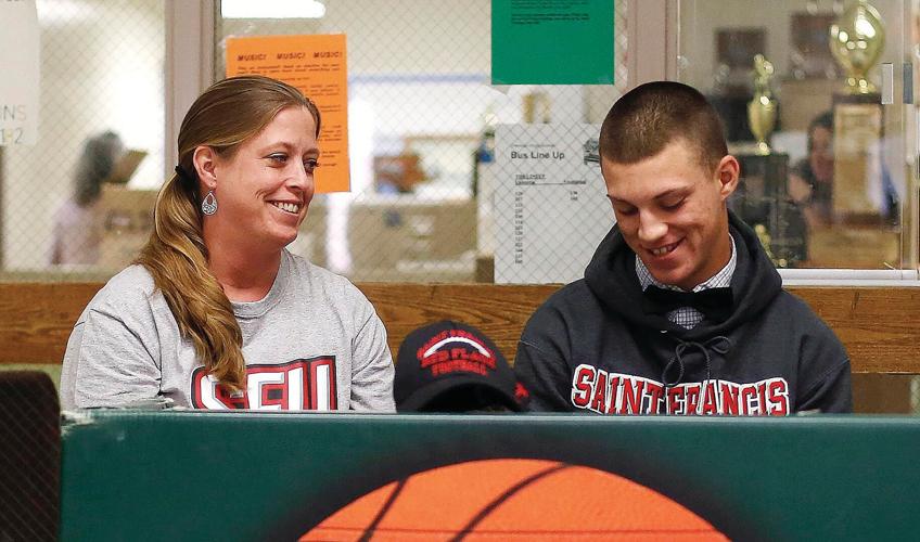 Taconic's Devon Walker makes it official, signs LOI to play football at ...