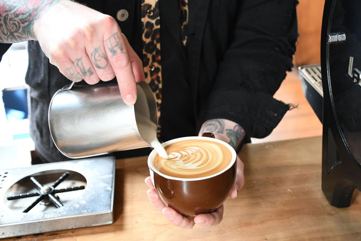 A barista makes a latte | | The Berkshire Eagle
