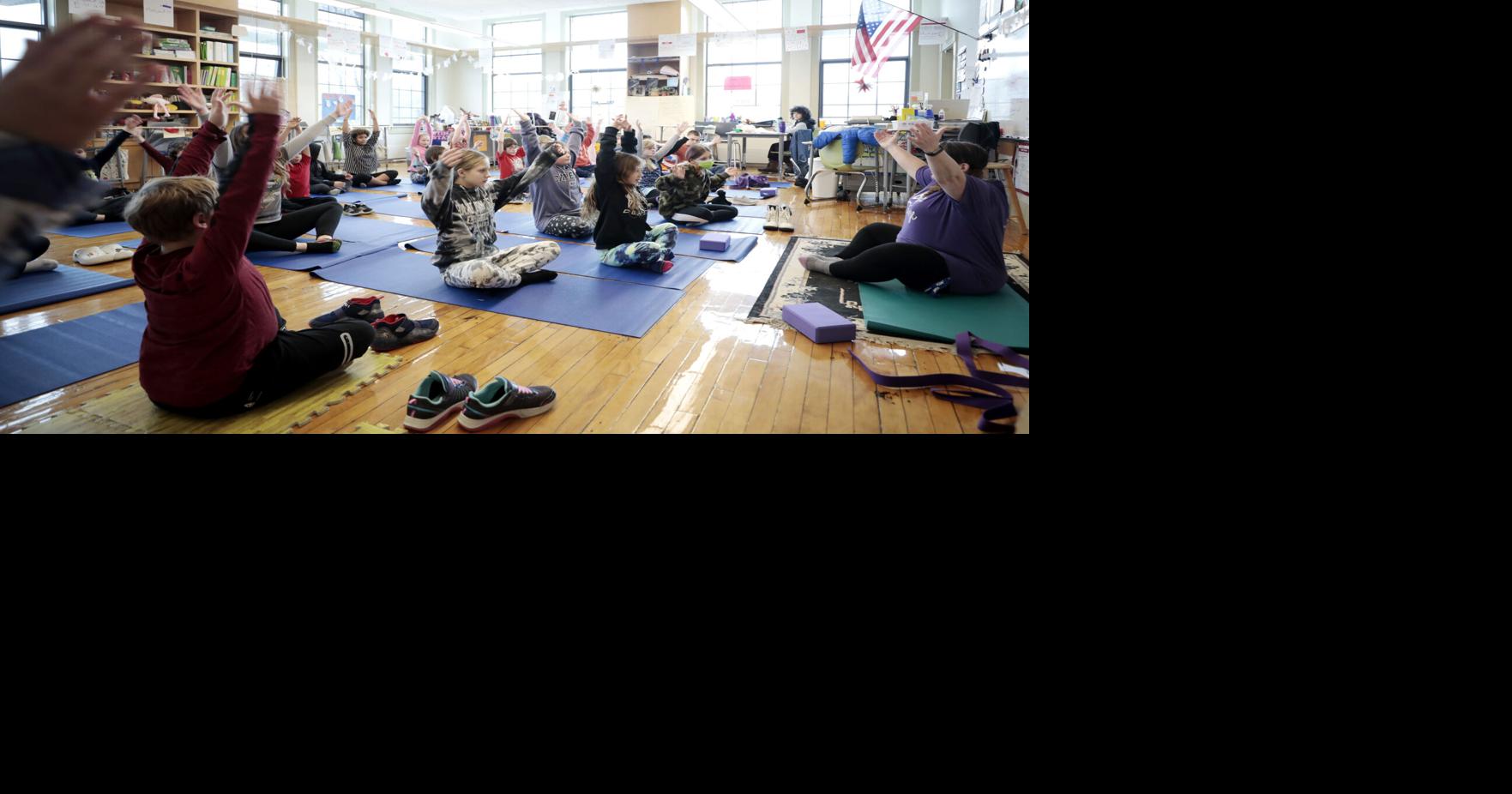 Photos: Fourth graders unwind with yoga at Colegrove Park Elementary ...