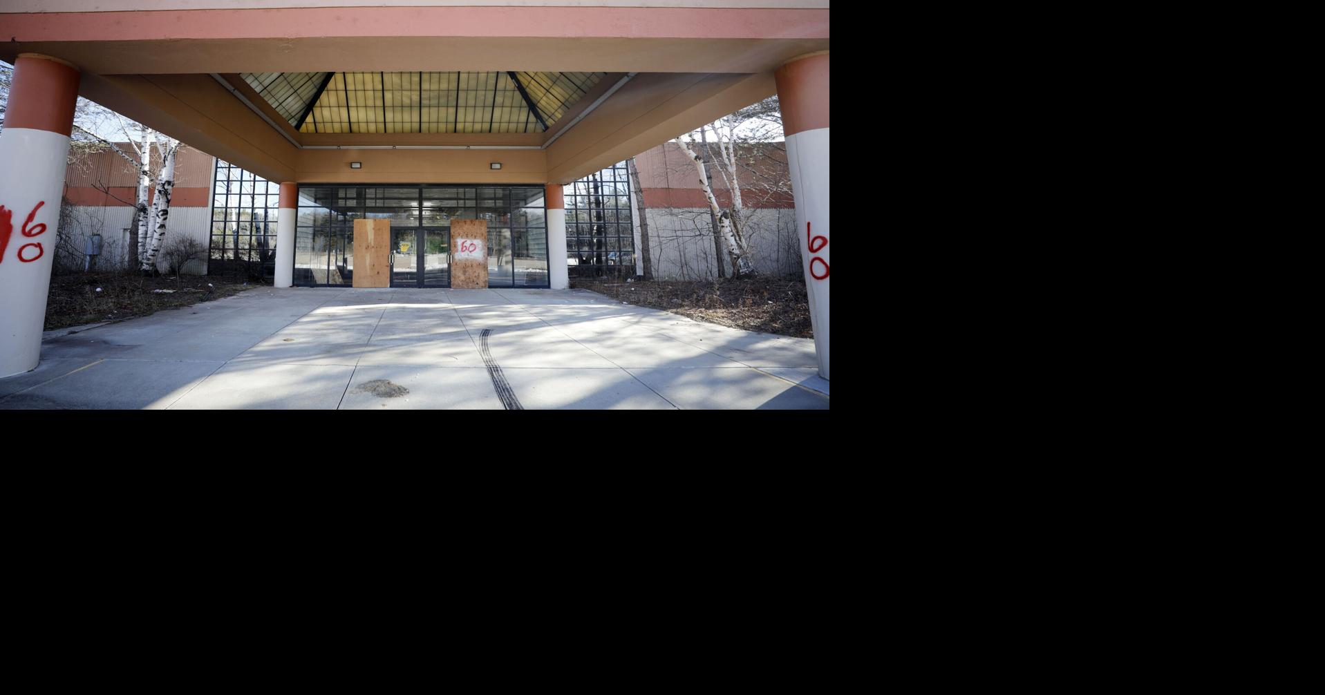 abandoned mall entrance with spraypainted numbers | | berkshireeagle.com