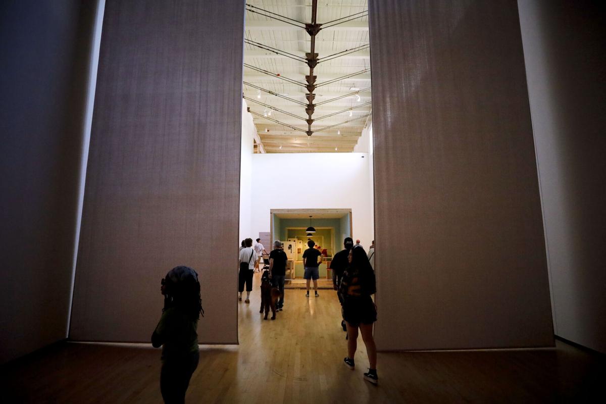 people walking through Mass MoCA | | The Berkshire Eagle