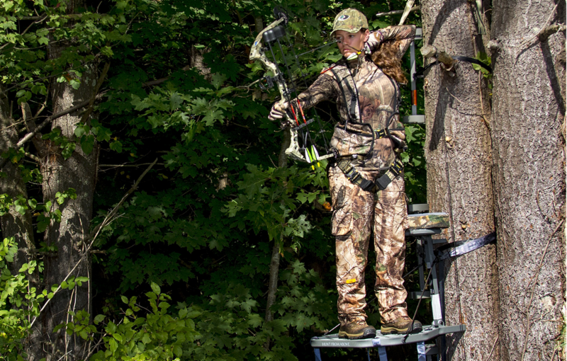 Person bow hunting from tree stand | | berkshireeagle.com