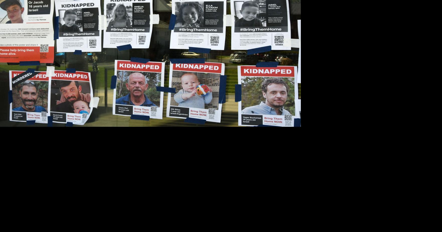 Posters of kidnapped people hang on the windows | | berkshireeagle.com