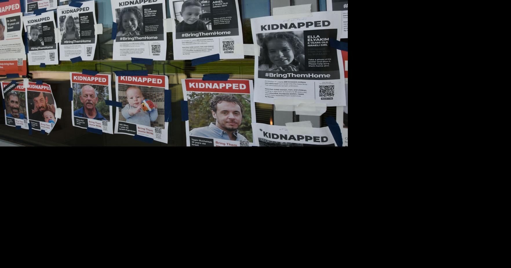 Posters of kidnapped people hang on the windows | | berkshireeagle.com