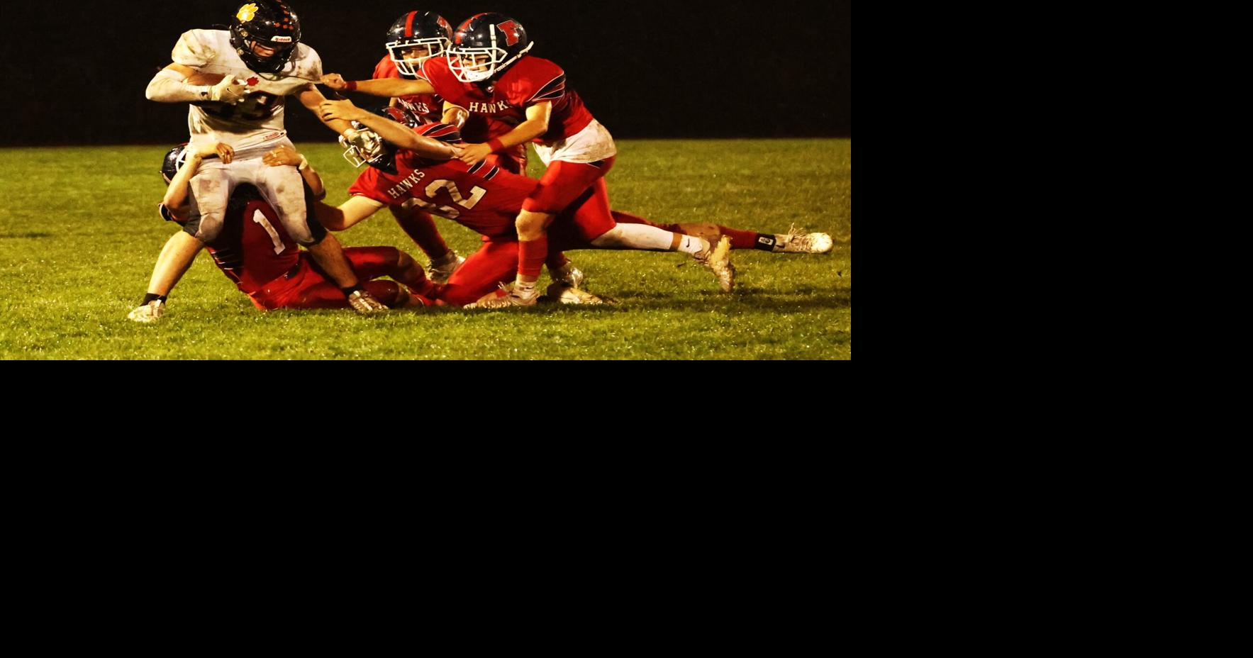 Photos: Lee High football battles in rainy road game at Frontier ...