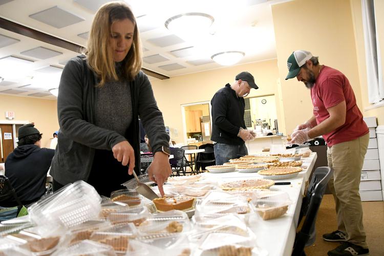 Photos: Meal prep for delivery on Thanksgiving day | Multimedia ...