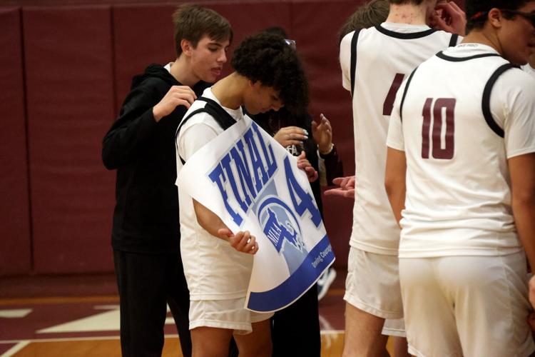 Photos: Monument Mountain boys basketball plays Cohasset in front of ...
