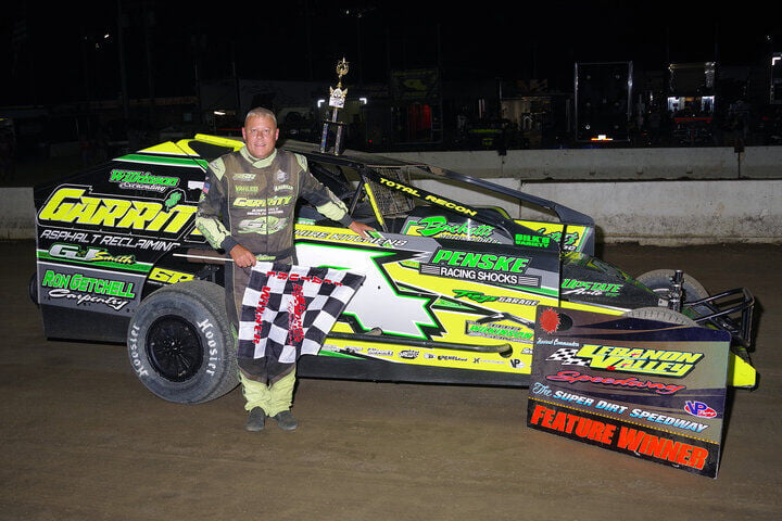 Andy Bachetti with checkered flag | | The Berkshire Eagle