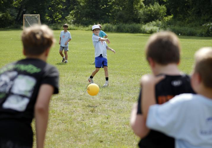 Photos: Pick-up youth kickball games held in Lee | Multimedia ...
