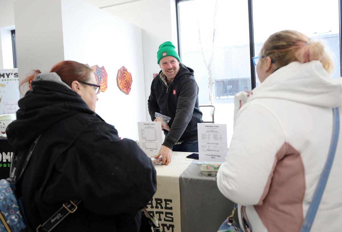 Michael Gallagher at Square Roots Farm market booth | | berkshireeagle.com