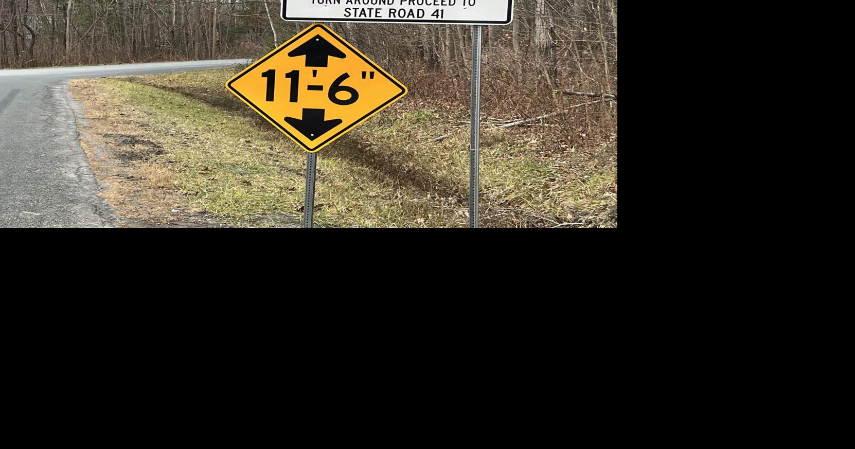 New sign aims to divert errant truck drivers from unpaved Richmond dead ...