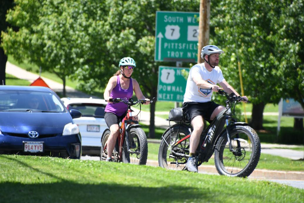 A couple ride two e-bikes | | The Berkshire Eagle