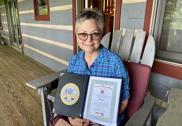 WNC woman carries award for Ukrainian bomb-sniffing dog | News ...