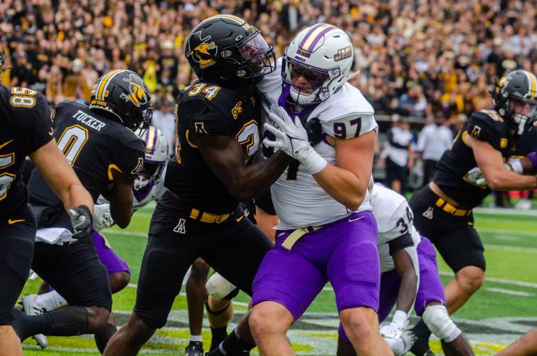 JMU remains undefeated, celebrating its victory over App State 32-28 ...
