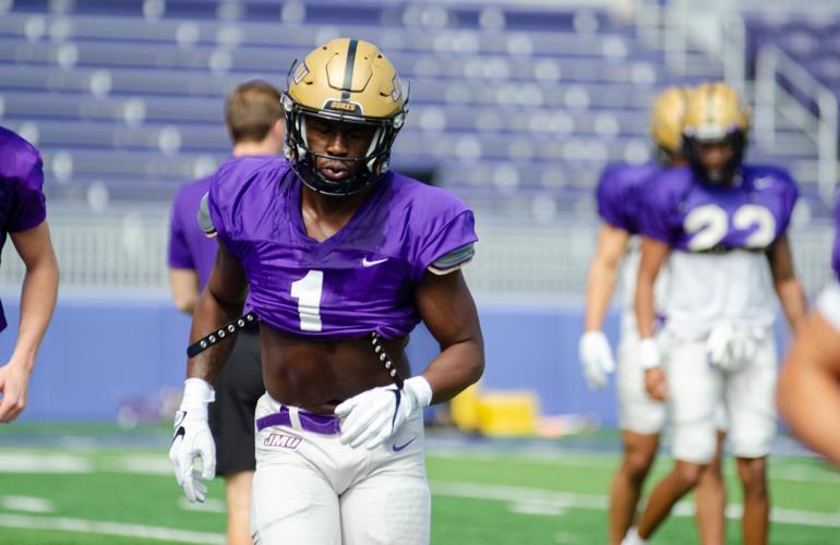 JMU football players shape up during spring football practice ...