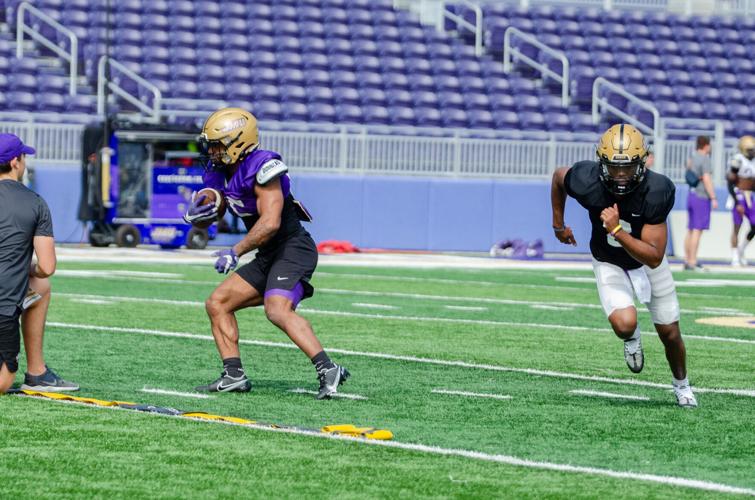 JMU football players shape up during spring football practice ...