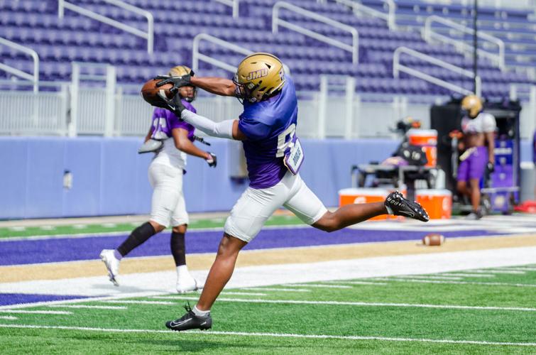 JMU football players shape up during spring football practice ...