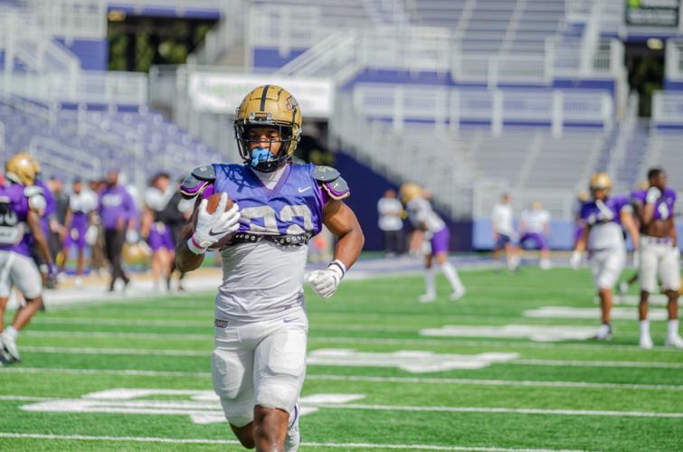JMU football players shape up during spring football practice ...