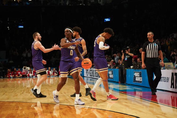 Photos: JMU men’s basketball defeats Wisconsin, advance to next round ...