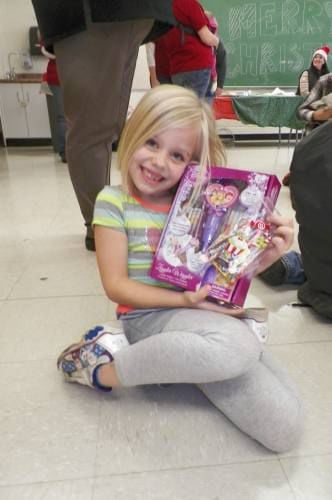 Santa and Mrs. Claus light up the Floyd M. Jewett Elementary School ...