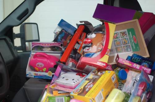 Firefighters collect toys for families in need | Local News ...