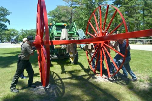 High-wheel cart replica new Cadillac monument to logging industry ...