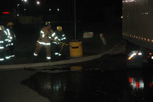 Gas gushes from ruptured tanks of semi-truck | Local News ...