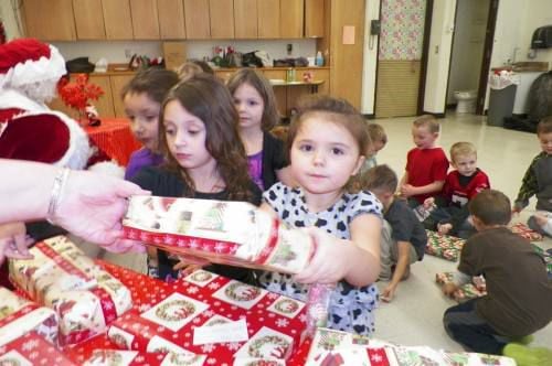 Santa and Mrs. Claus light up the Floyd M. Jewett Elementary School ...