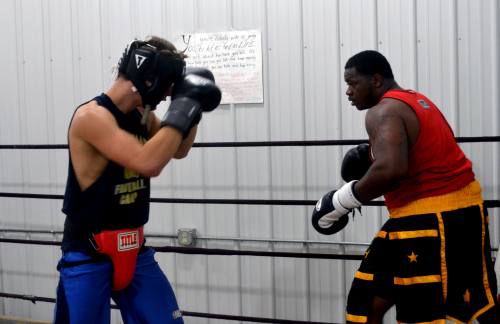 Boxers go 40 rounds in club fundraiser | Local News | cadillacnews.com